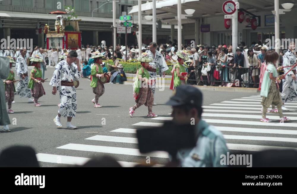 Japanese Kids In Colourful Costumes Marching In A Parade During The ...
