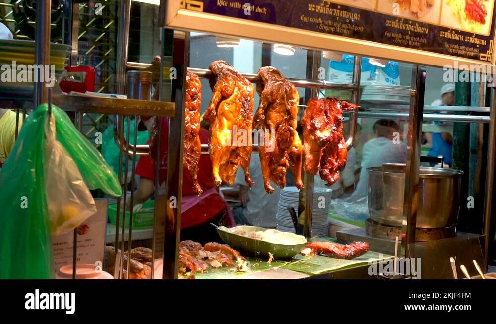 Roasted Chicken Being Sold In A Food Stall In Chinatown, Bangkok ...