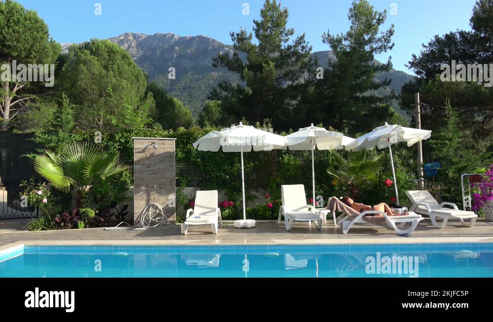 Woman sleeping pool Stock Videos & Footage - HD and 4K Video Clips - Alamy