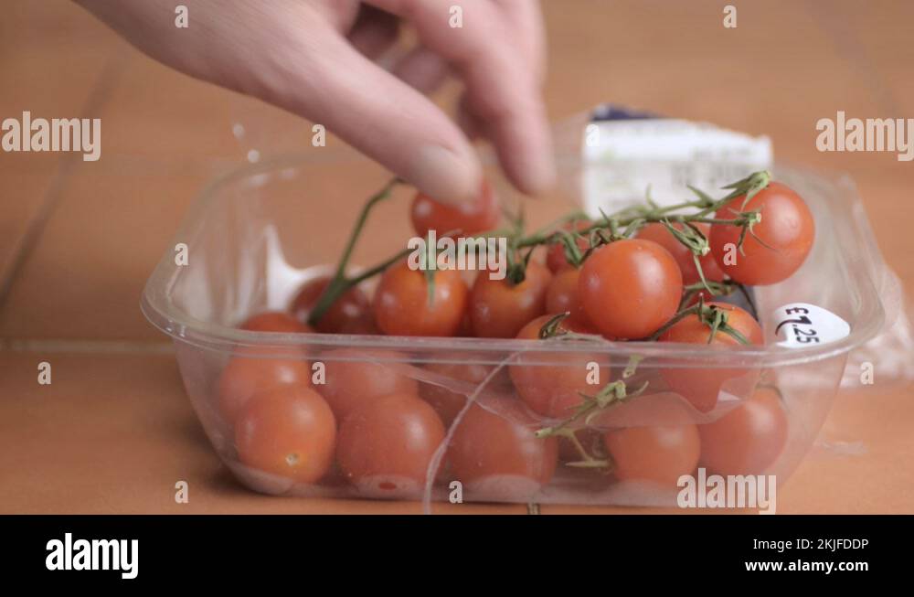 Packet of tomatoes Stock Videos & Footage - HD and 4K Video Clips - Alamy