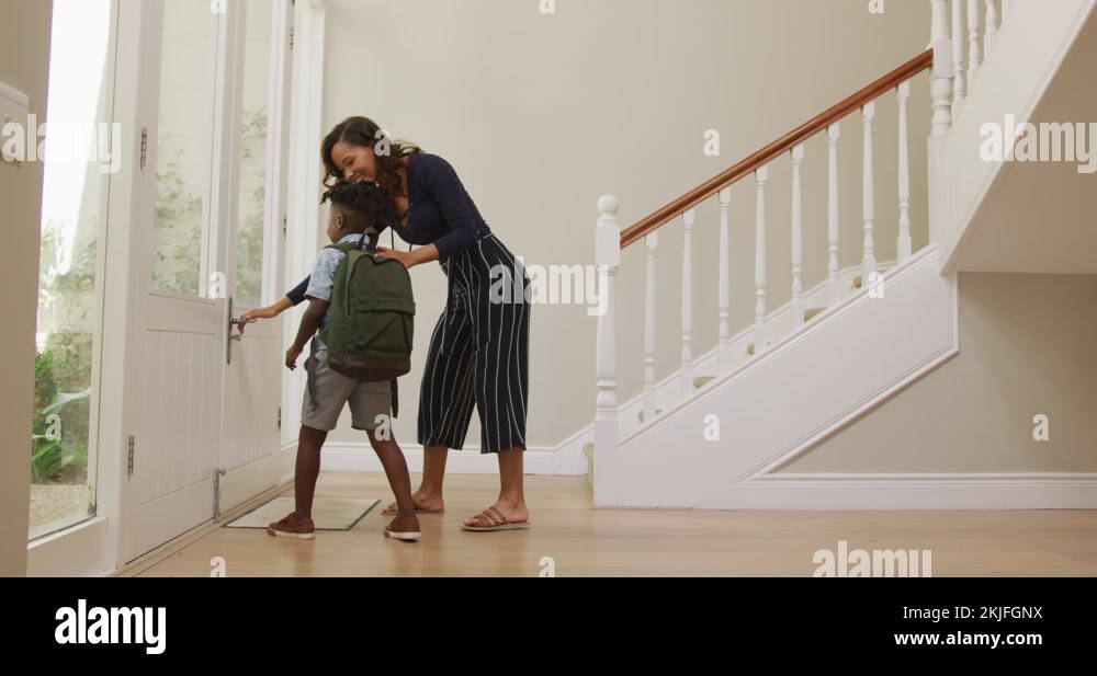 Mother saying goodbye to her son Stock Video Footage - Alamy