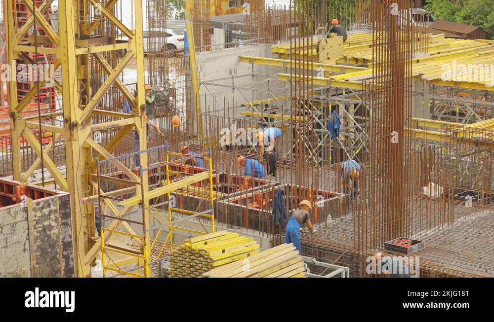 Reinforced concrete structure, construction process, people at the ...