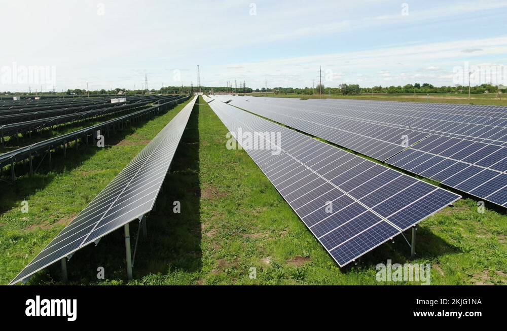 Rows of the solar panels at the solar power station, alternative energy ...