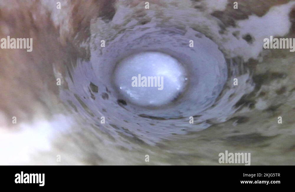 Plumbing lateral scan sewer borescope camera travels down a drain pipe ...