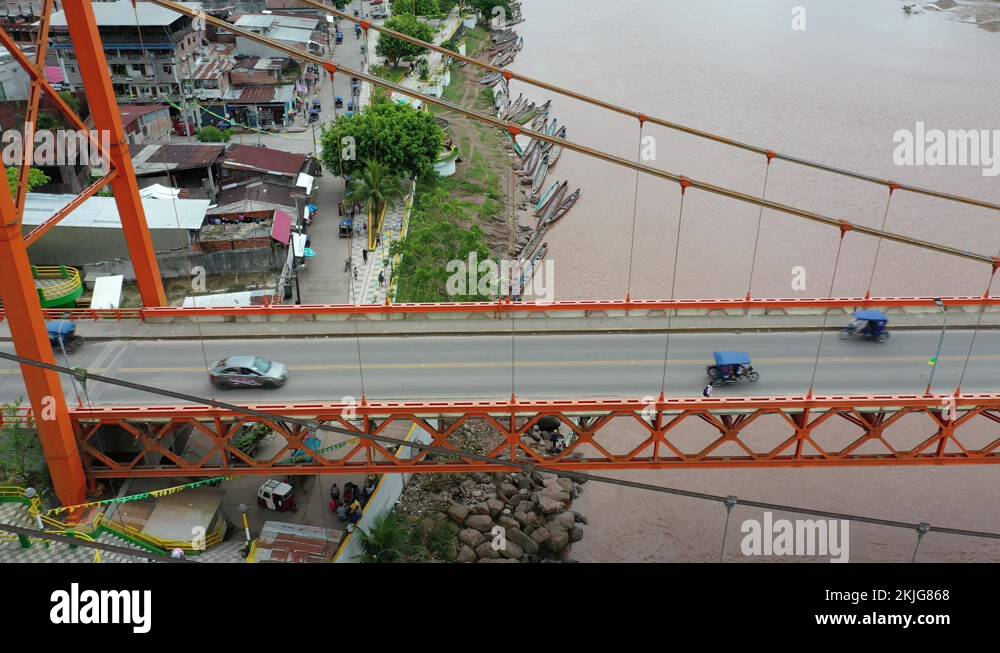 Peru aerial view of cars, bikes, trucks and rickshaw crossing a ...