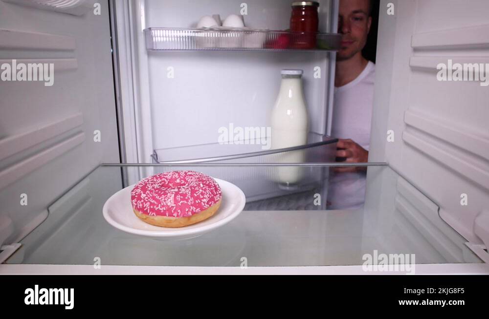 Grab a donut Stock Videos & Footage - HD and 4K Video Clips - Alamy