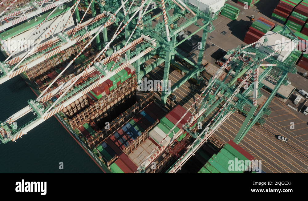 4K aerial of industrial port, Los Angeles, USA. loading container ship ...