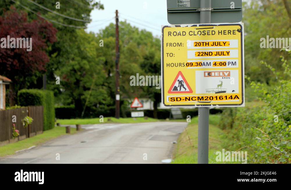 Roadworks road closed sign Stock Videos & Footage - HD and 4K Video ...