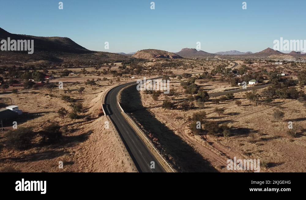 4K aerial video of highway and Aris railway station in Namibia Stock ...