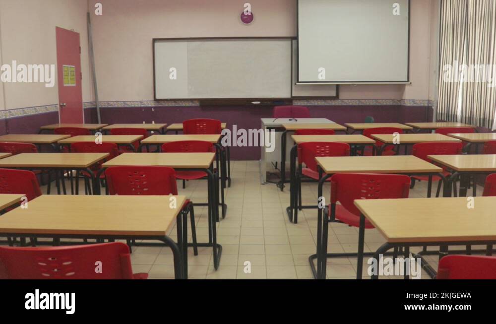A empty classroom. Small class room with chair, table and whiteboard ...