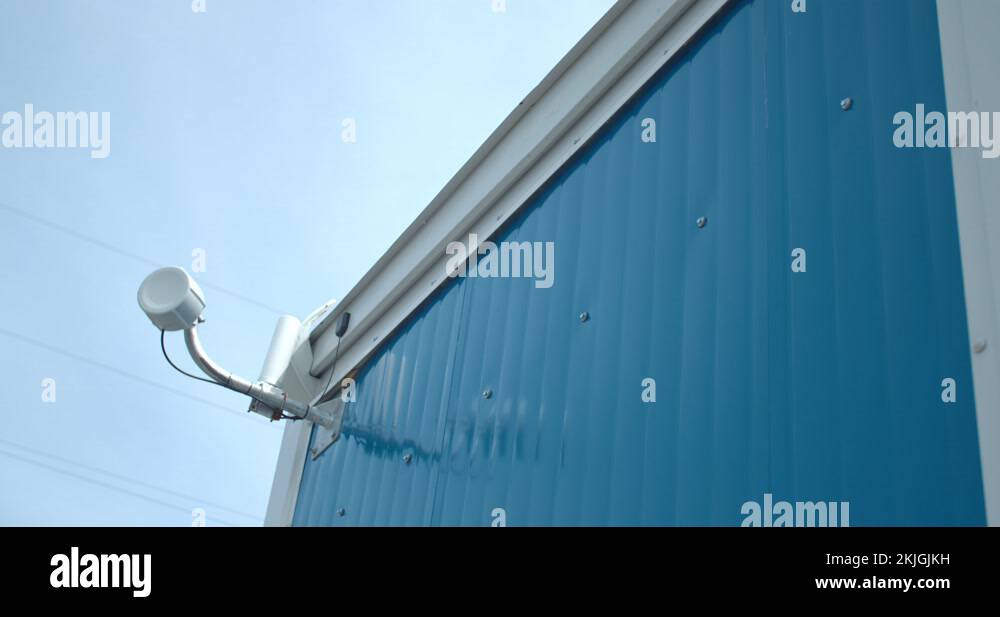 Security camera on the side of a building, sky, 4k Stock Video Footage ...