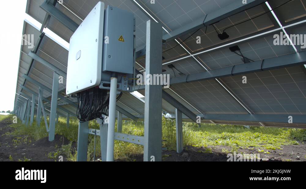 Row of the solar panels, view from the back with a control box, 4k ...