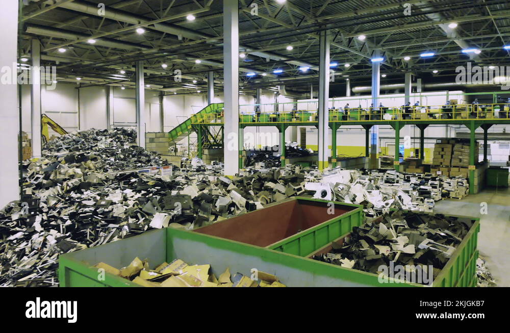 People work at recycling factory with piles of garbage Stock Video ...