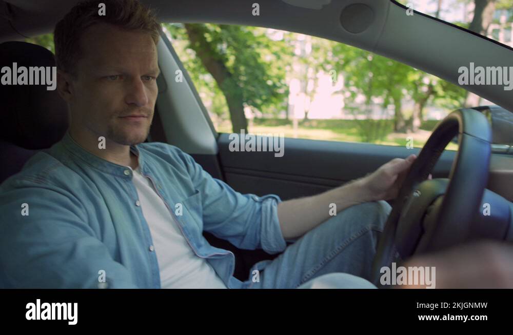 Electric car driver using navigation screen Stock Video Footage - Alamy