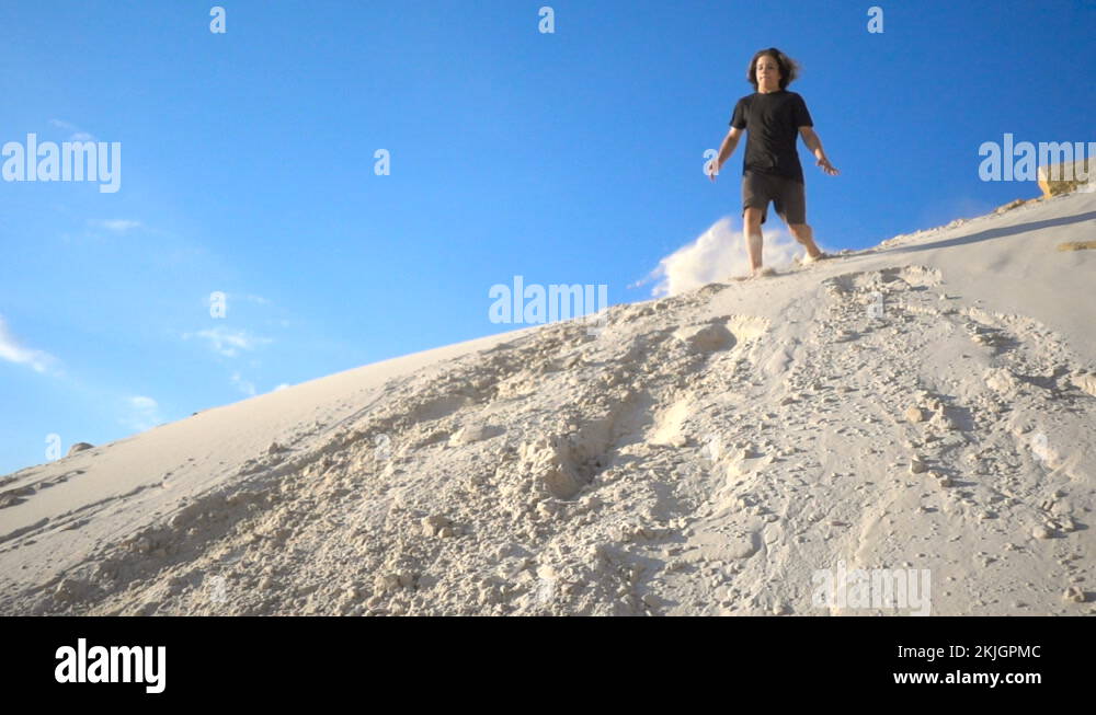 Boy jumping from sand Stock Videos & Footage - HD and 4K Video Clips ...