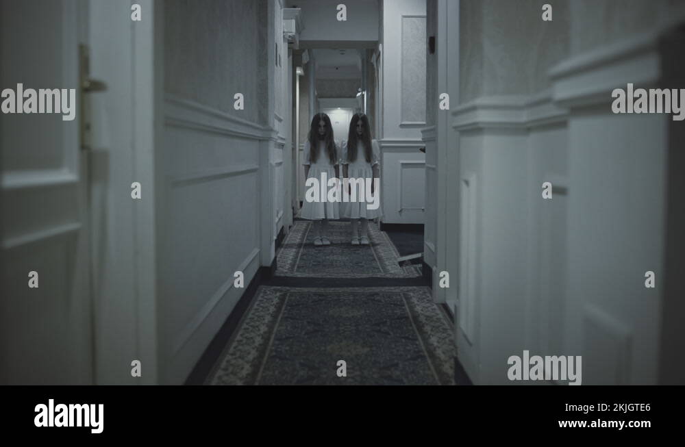 Strange twins standing in old haunted house, vintage footage, creepy ...