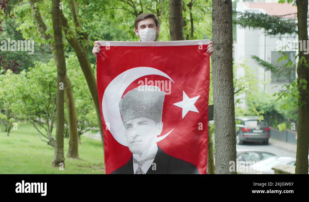 Republic of Turkey founder Ataturk, the Turkish flag waving illustrated ...