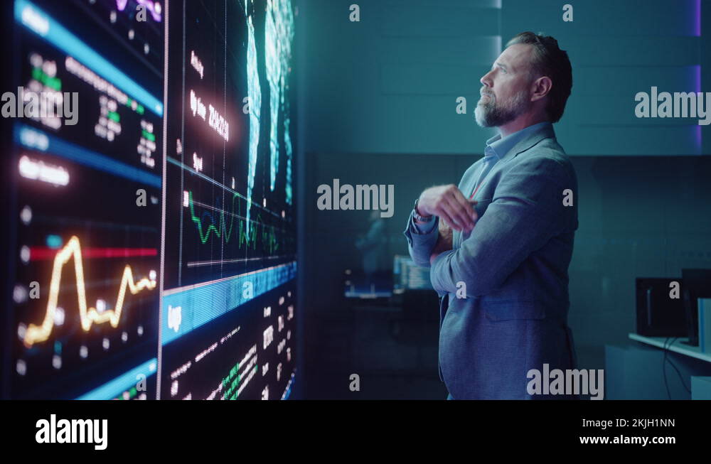 Data Scientist Looks at Global Map Chart on Big Display Stock Video ...