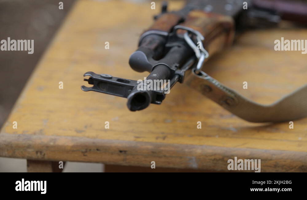 Students learn to assemble AK-47 rifles Stock Video Footage - Alamy
