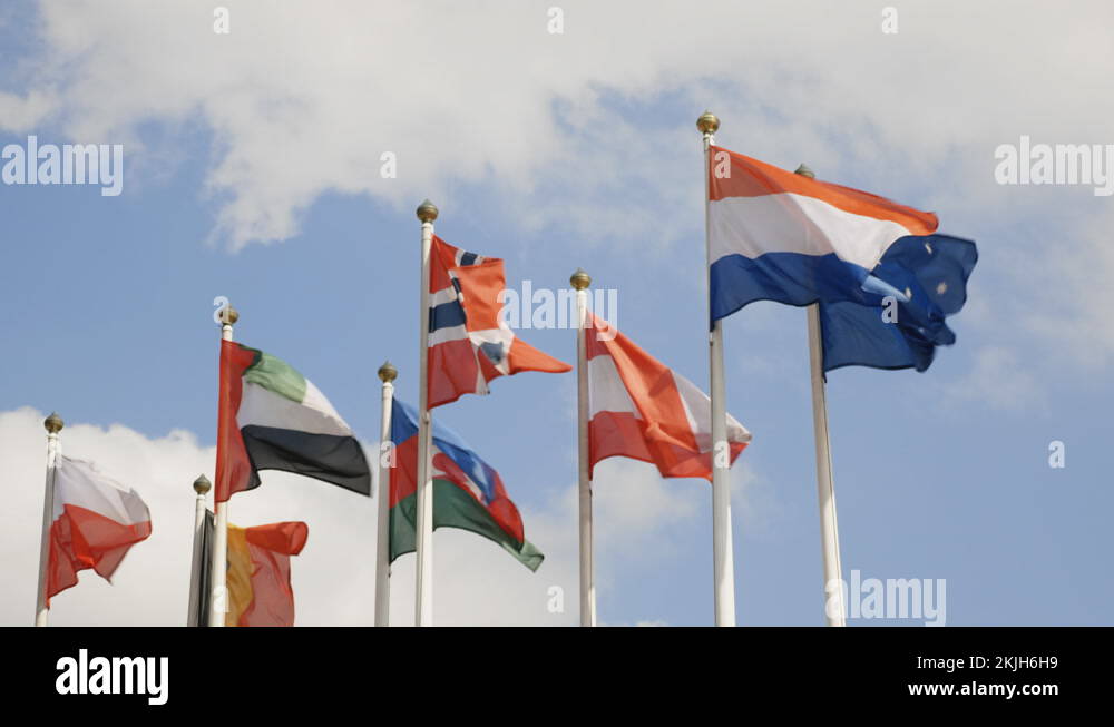Various national flags with the EU flag under a blue sky Stock Video ...