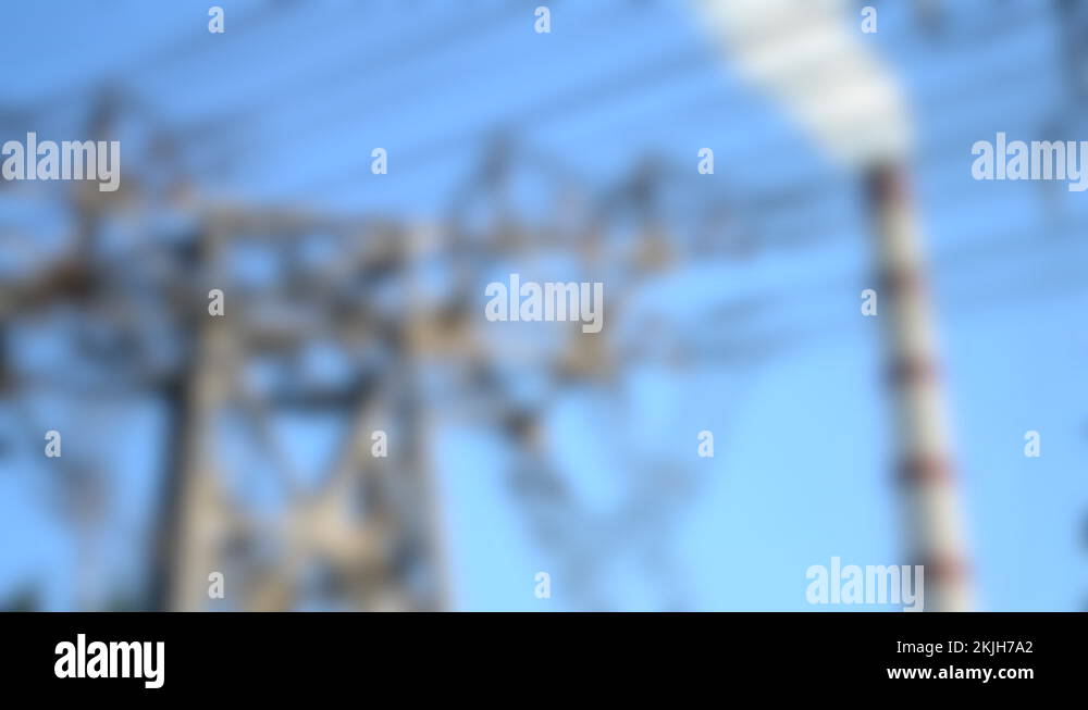 Blurred background. Great support for power lines with many of wires ...