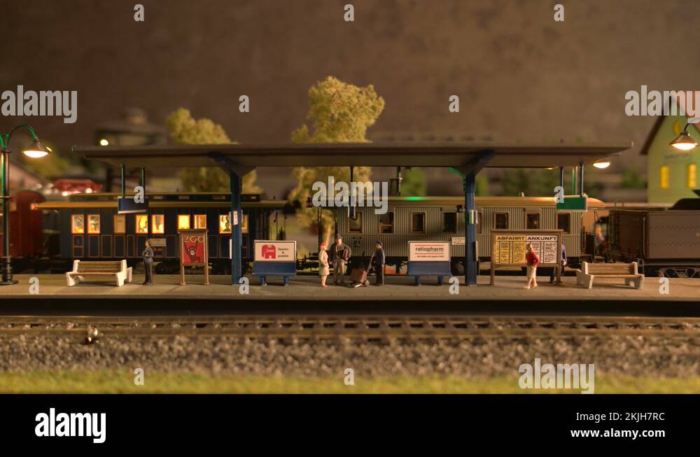 Model of railway station with people waiting for a train Stock Video ...