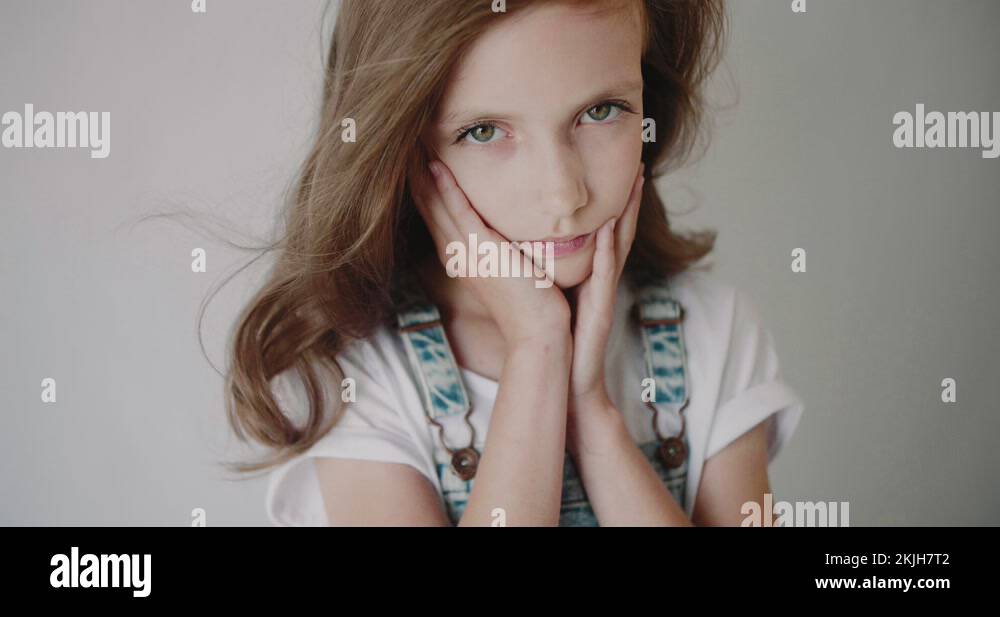 Twinge Of Toothache Girl Holding Her Cheek Toothache White Background Stock Video Footage Alamy