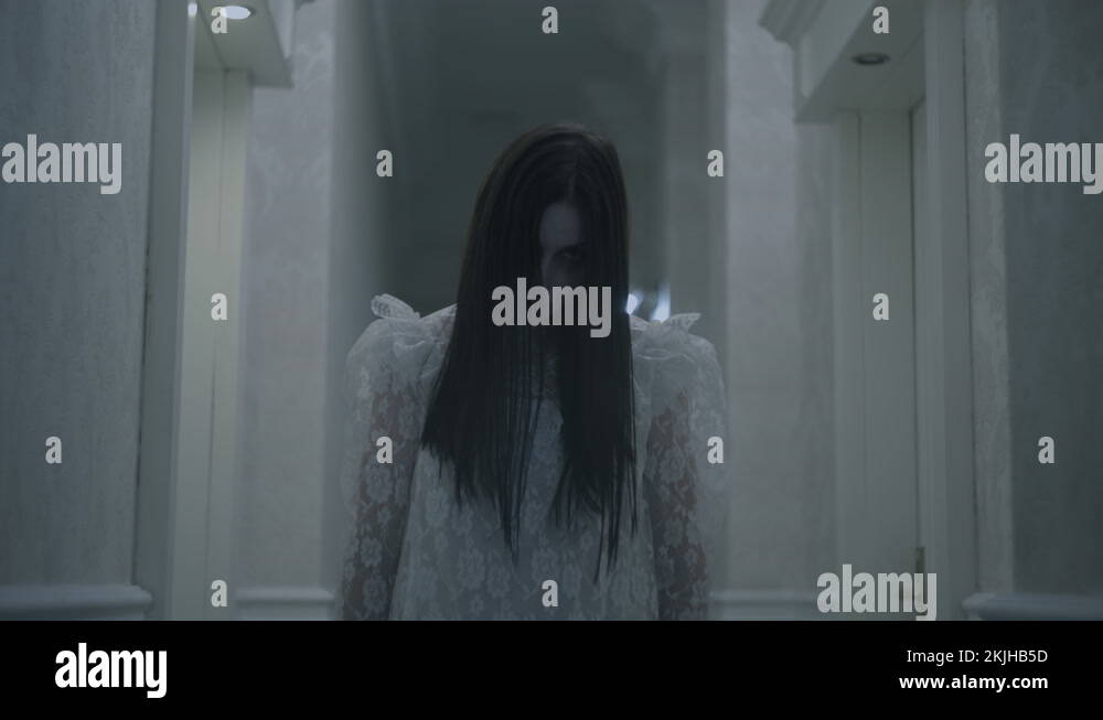 Female ghost stretching hand toward camera, rise of the dead, creepy ...