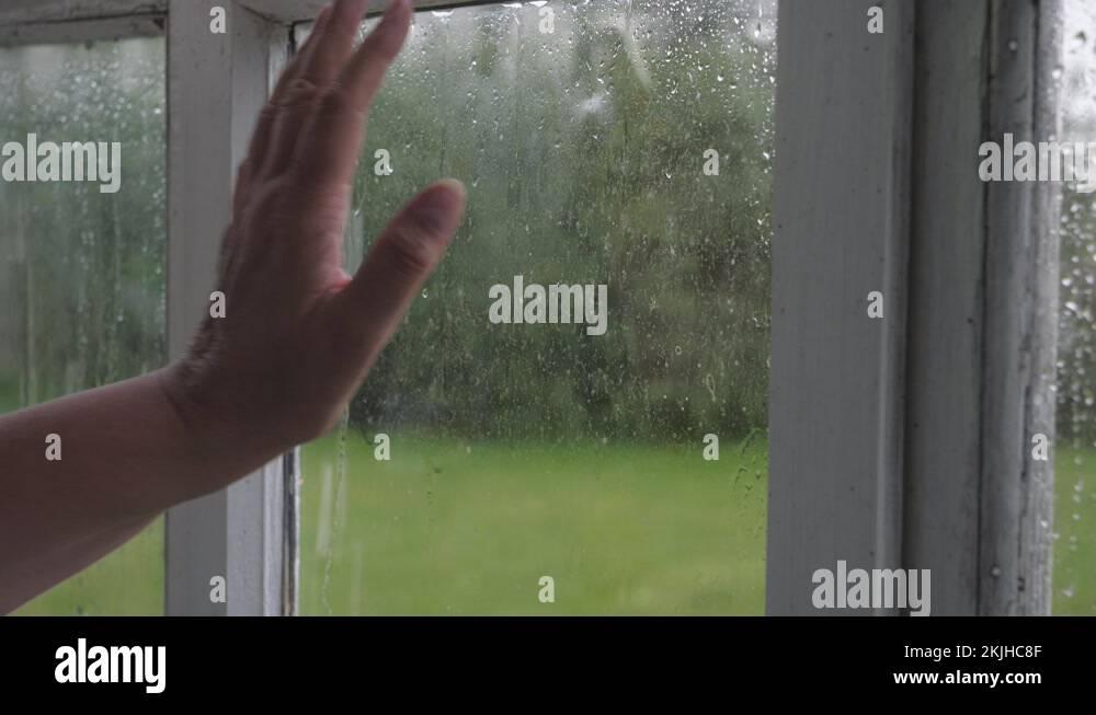 Raining hand window Stock Videos & Footage - HD and 4K Video Clips - Alamy