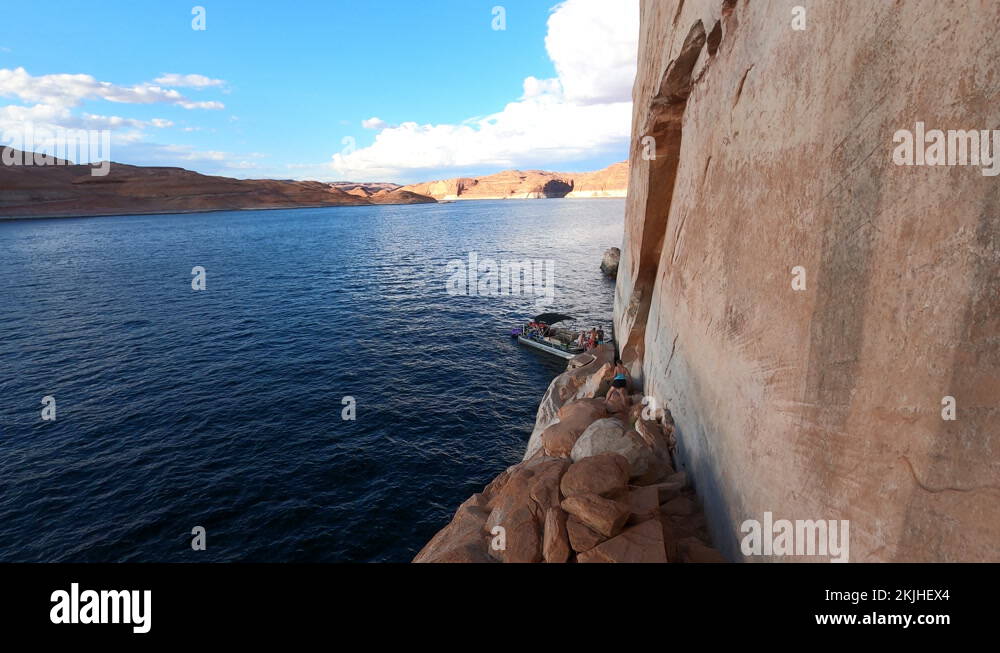 Climbing down rock cliff to boat on Lake Powell Utah 4K Stock Video ...
