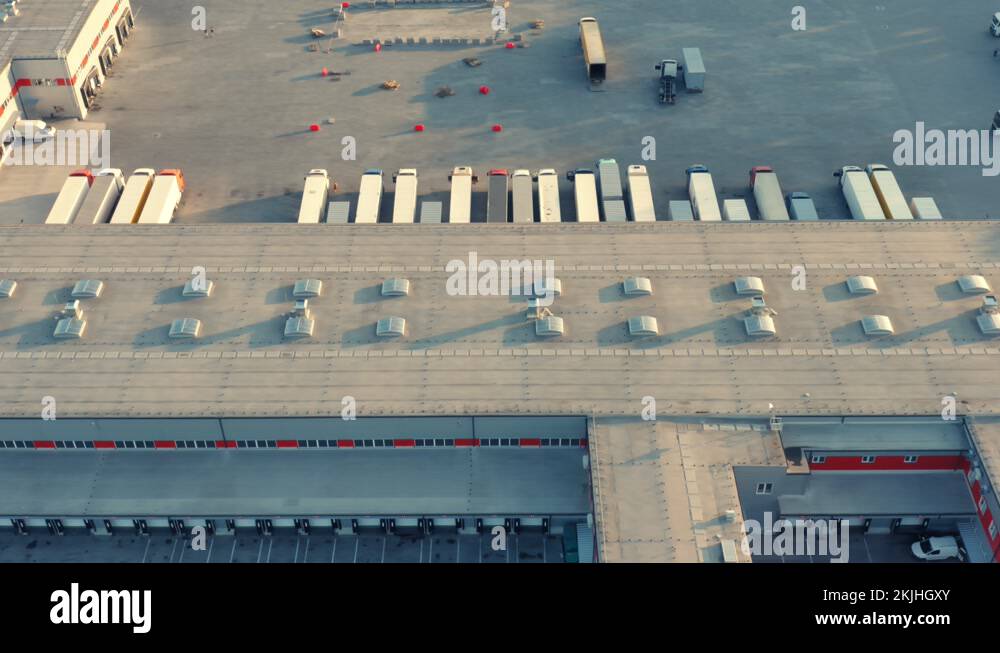 Logistics park with warehouse, loading hub with many semi trucks with ...