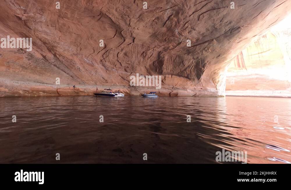 Boats deep inside cave on water of Lake Powell Utah 4K Stock Video ...