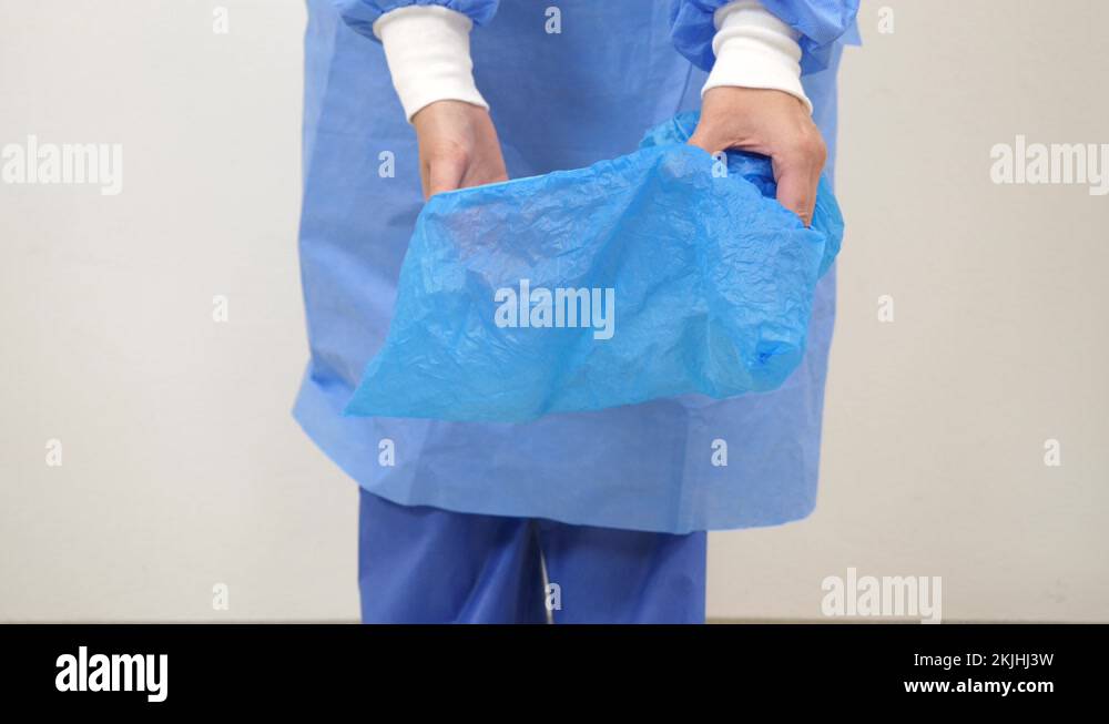 Blue medical shoe covers Stock Videos & Footage - HD and 4K Video Clips ...