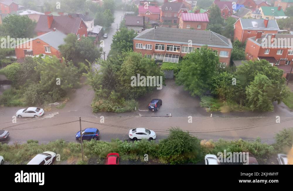 Poorly developed infrastructure of city. Flood and dirty water flow ...