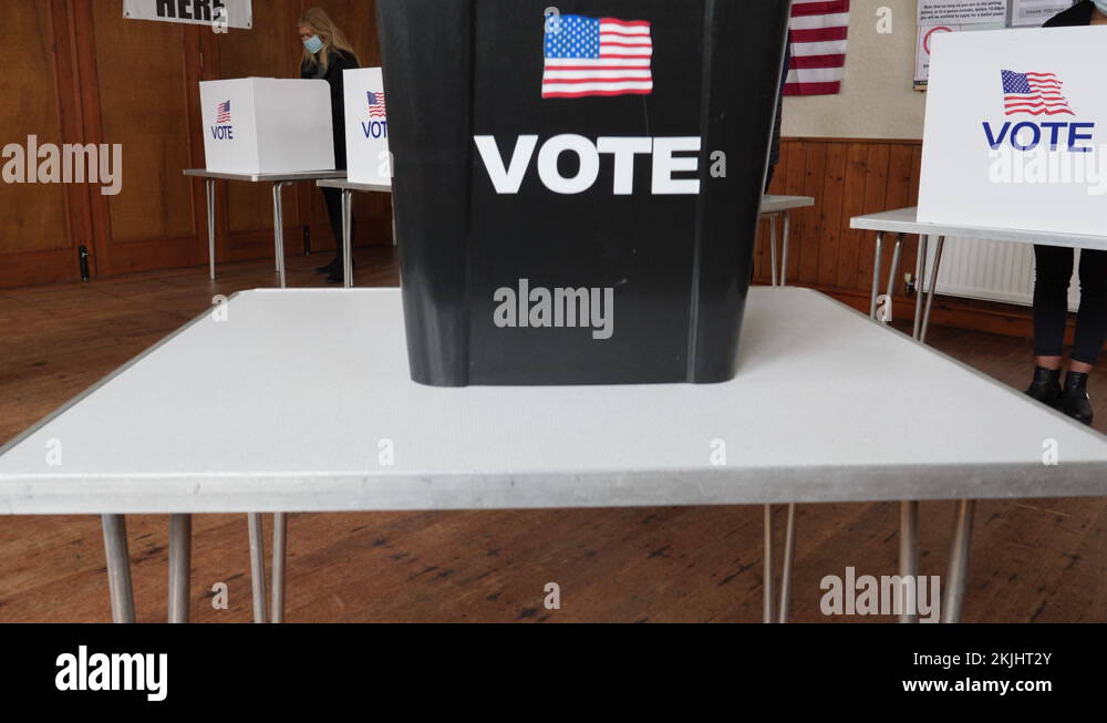 4K: Caucasian Female Voter voting at Polling Place for USA Election ...