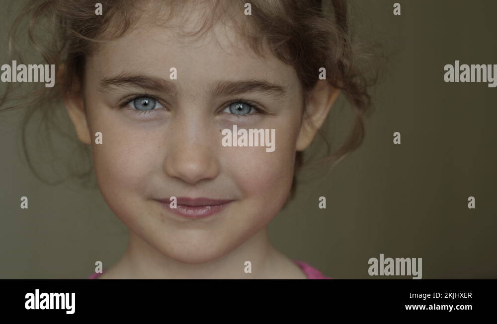 Portrait Little Girl Looking at Camera. Young Laughs Happily Child with ...