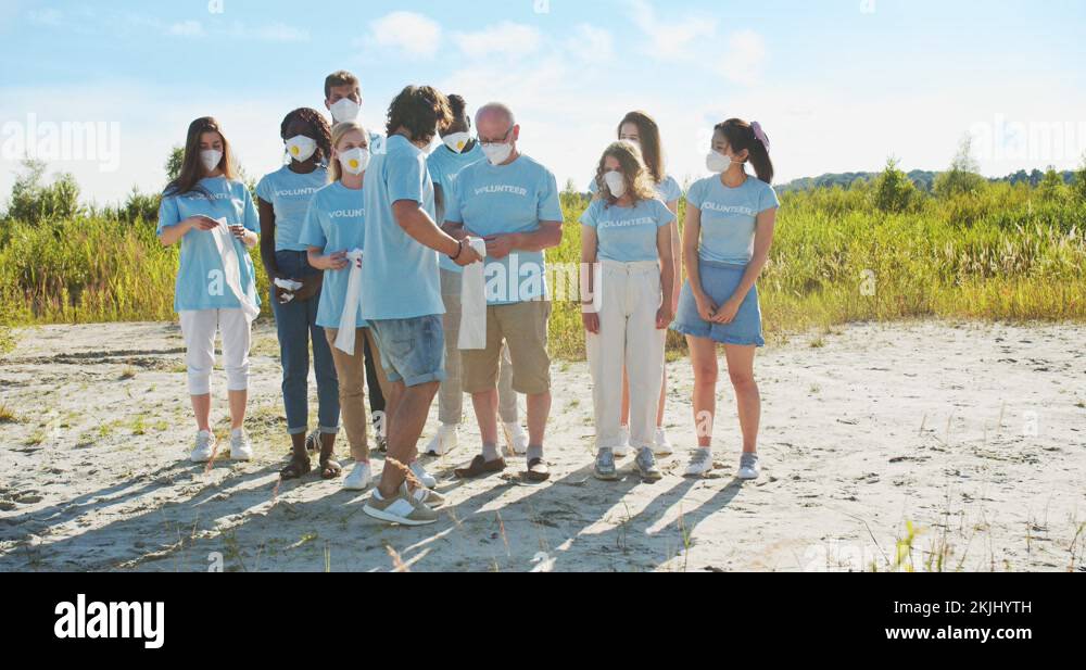 A group of volunteers are gathered to conserve nature, environment. A ...