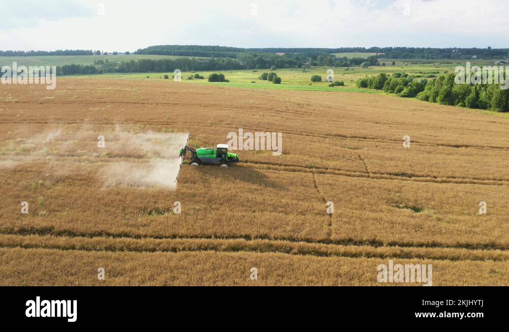 Rapeseed field and farming equipment Stock Videos & Footage - HD and 4K ...
