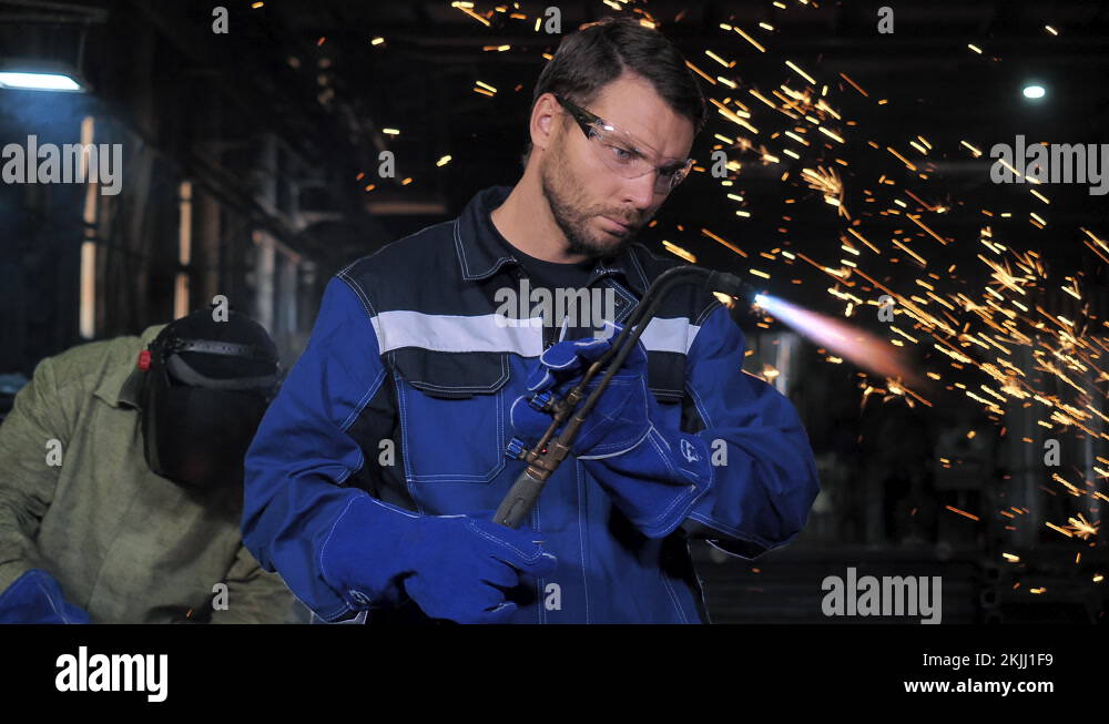 Welding work, fun welder man, safety metal manufacturing heavy industry ...