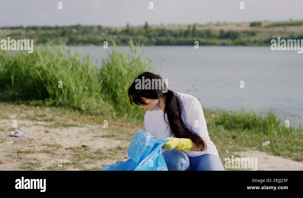 Concept of recycling rubbish group of volunteers multiethnic picking up ...