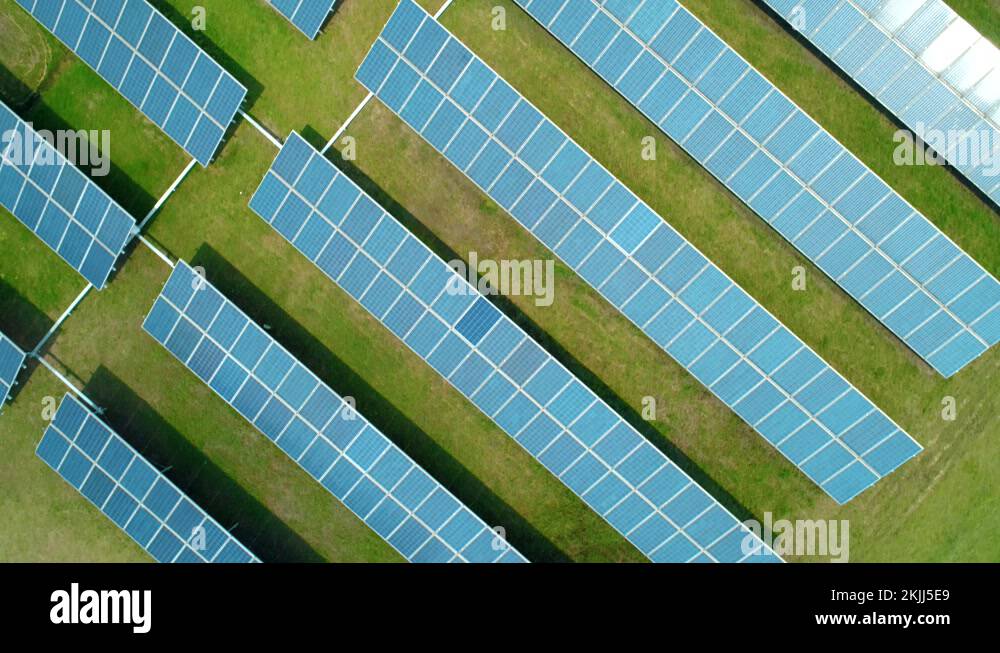 Aerial top down view of Solar Panels Farm (solar cell) with sunlight ...