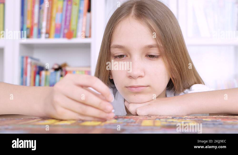 Kid Doing Jigsaw Puzzle, Bored Child Playing Smart Games at Home ...