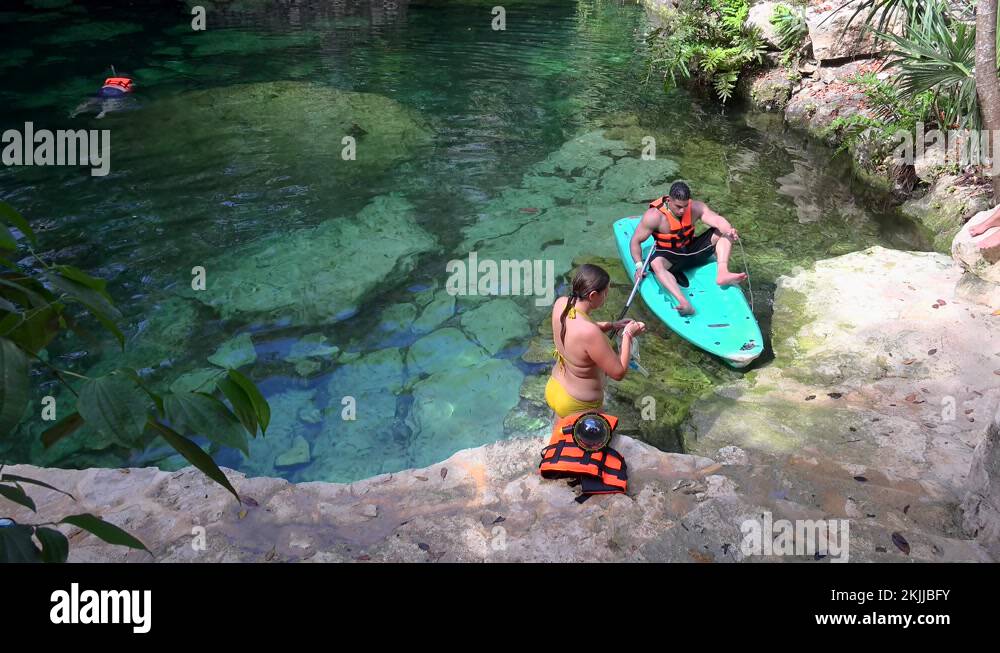 Tourist activities in the Uch Ben Ha open cenote of Kantun-Chi ecopark ...