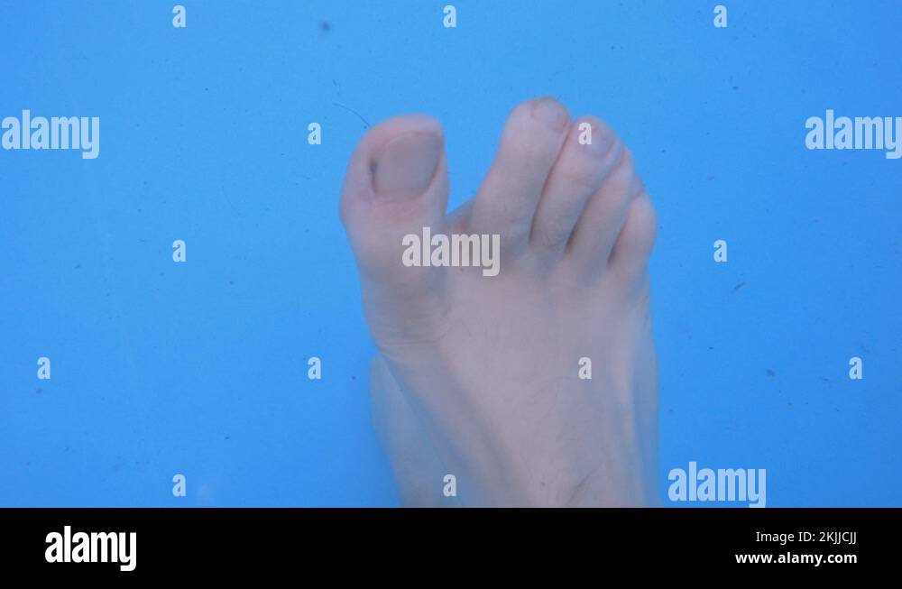 Male foot in water Stock Videos & Footage - HD and 4K Video Clips - Alamy