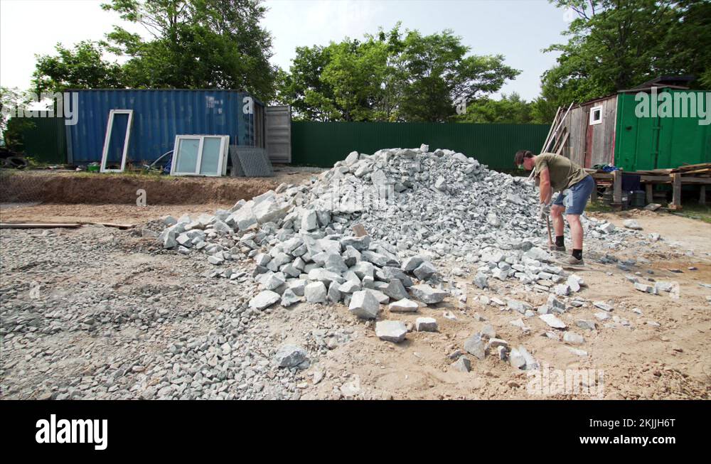 Breaking stones Stock Videos & Footage - HD and 4K Video Clips - Alamy