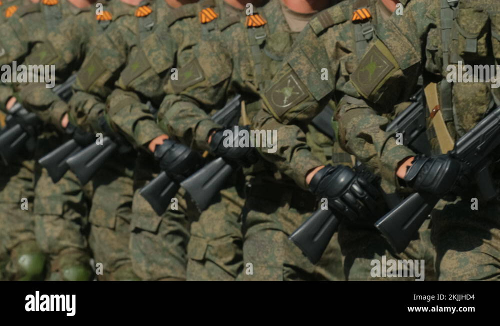 March military officers with assault rifle kalashnikov ak 47 in arm ...