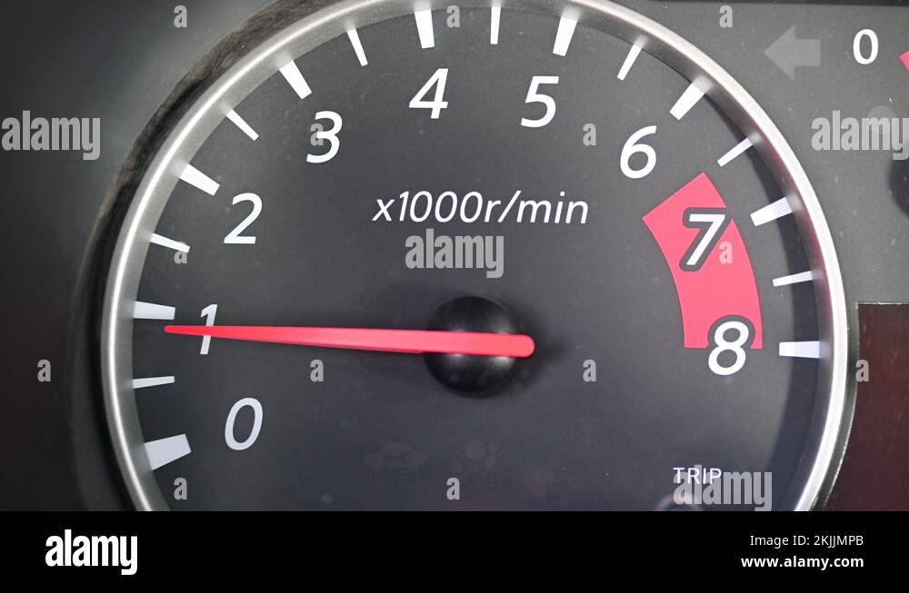 The tachometer on the vehicle dashboard. Red arrow shows number of ...