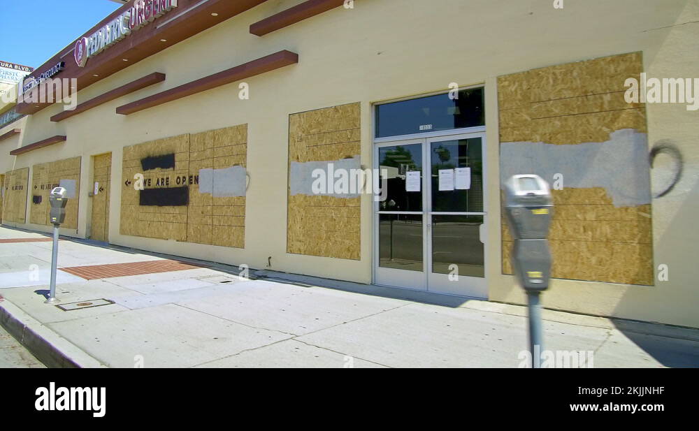 Businesses are covered in plywood as a result of BLM violent protests ...