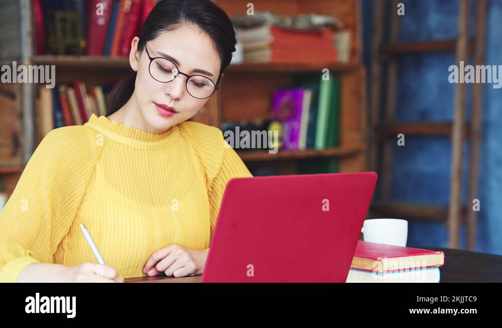 Young asian woman studying Stock Videos & Footage - HD and 4K Video ...
