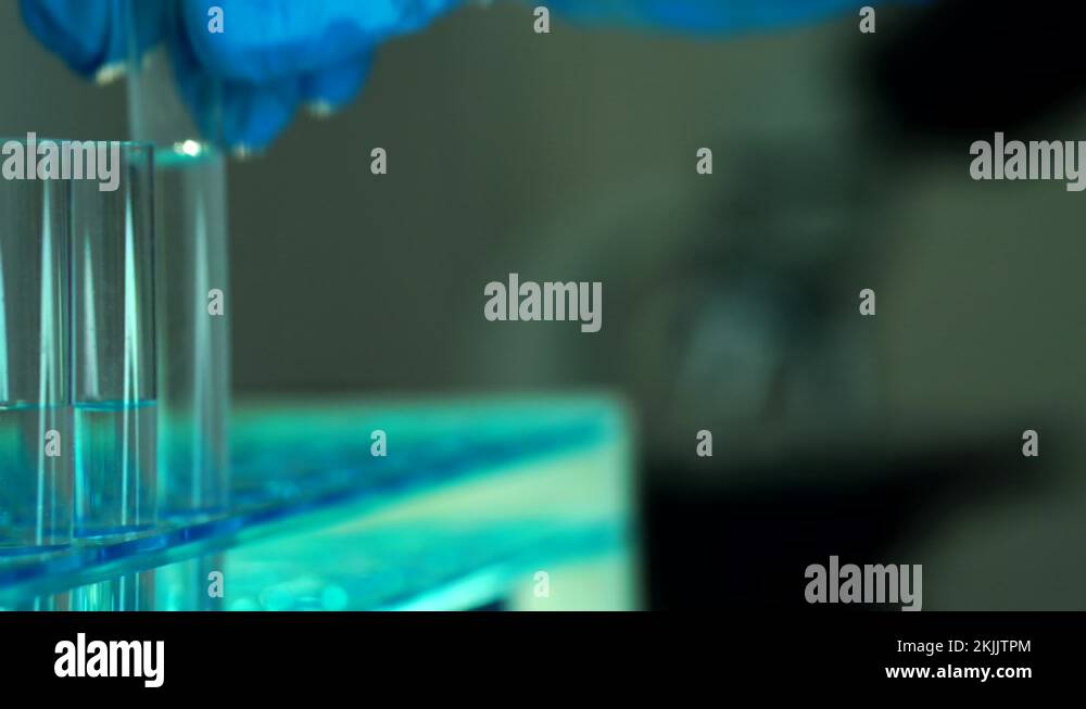 Cinematic Pharmaceutical Scientist Placing Test Tubes In Laboratory ...